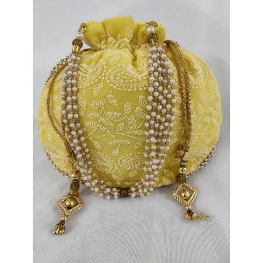 Collection of Four Ethnic Beautiful Potli Bags (Color: Golden, Red ...